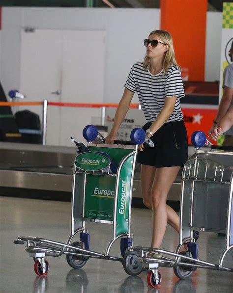 Maria Sharapova Leggy In Mini Skirt Arrives At Melbourne Airport