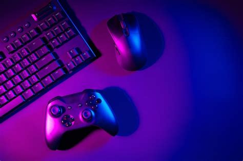Premium Photo Computer Keyboard Mouse And Joystick On Black Background