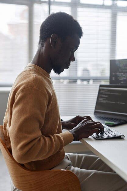 Premium Photo Vertical Image Of African American Programmer Writing