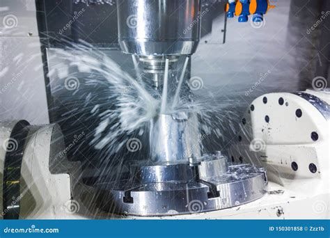 5 Axis Cnc Milling Machine At Work With Coolant Under Pressure And Motion Blur Of Streams