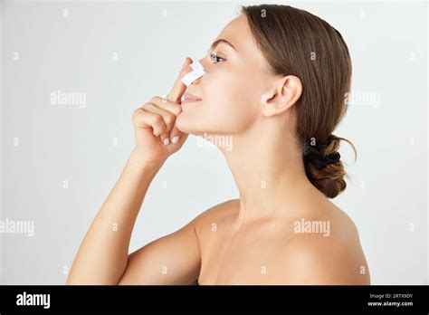 Beautiful Young Woman With Well Kept Skin Having Plaster On Nose After