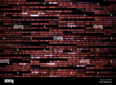 Computer Display Screen With Red Binary Code Moving In The Background Blur Defocus Blue Bokeh