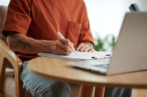 Premium Photo Closeup Image Of Blogger Working On Script For His Blog