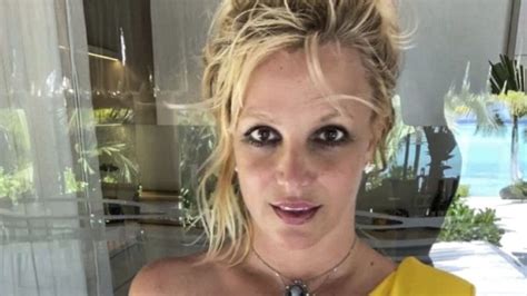 Britney Spears Posts Flirty Pool Day Video In Tiny String Biкini With Manager Benjamin Mallin