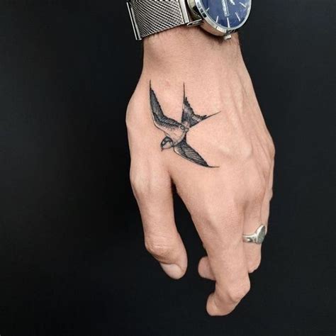 Bird Tattoos For Men On Hand Bold Symbolism And Timeless Design