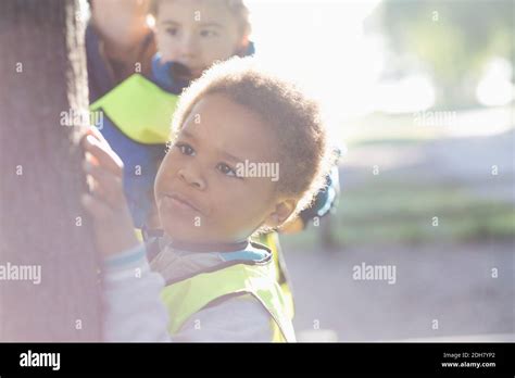 Babe Exploring Tree On Playground Stock Photo Alamy