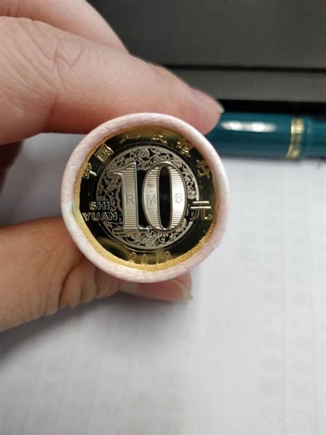 新兌換的狗年紀念幣，你覺得咋樣？ 每日頭條