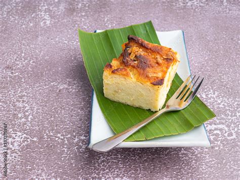 Thai Custard Cake Or Khanom Mo Kaeng On Banana Leaf And Spoon On White