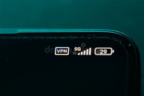 Close Up Of A Smartphone Screen Displaying Vpn 5g Network And Battery Status Icons