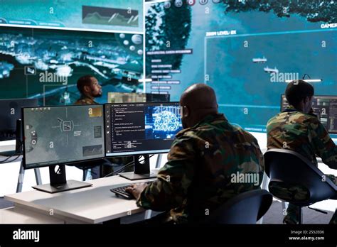 Military Specialist In A High Tech Control Center Managing Satellite Radar Surveillance