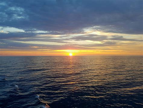 Pictures Of Sunrises Over Water