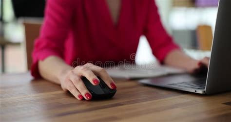 Business Woman Manually Typing On Computer Keyboard Using A Mouse
