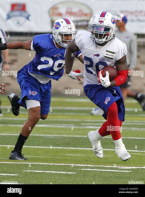 Buffalo Bills Running Back Anthony Dixon 26 Runs Past Corner Back Ross Cockrell 29 During