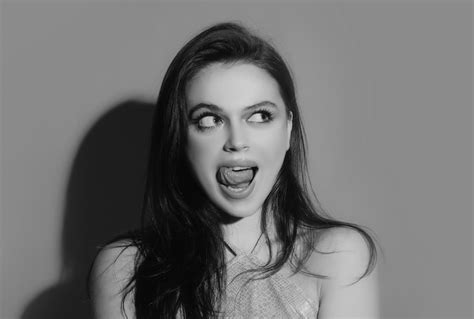 Premium Photo Beautiful Modern Model Shows Tongue Model With Sticking