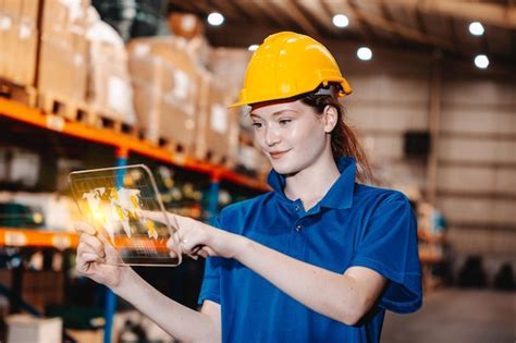 Premium Photo Young Women Worker Using Digital Tablet Device With