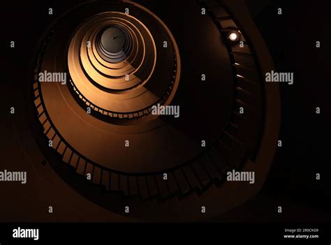 Spiral Staircase In A Tall Multi Floor House In The Form Of A Golden Ratio Architecture