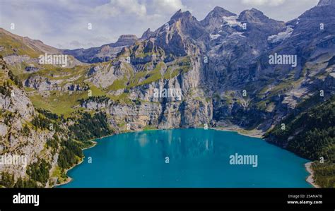 Oeschinensee Often Referred To As Oeschinen Lake Is A Picturesque