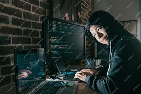 Premium Photo Evil Young Computer Programmer As Hacker And Design Bad Data System Hacking