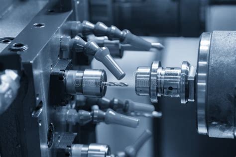 The CNC Lathe Machine Making The Thread At The Metal Shaft Stock Photo Image Of Manufacture