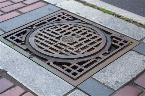 城市街道下水道井盖特写高清图片下载 正版图片600194232 摄图网