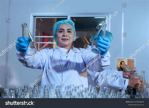 Professional Male Female Workers Qc Inspecting Stock Photo 2239268959 Shutterstock