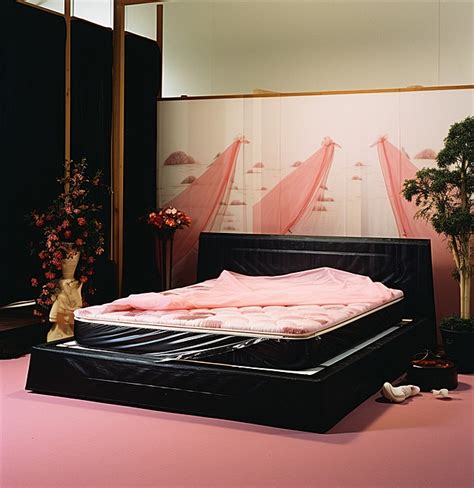 A Large Bed In A Small Room Background Indoor Interior Bed