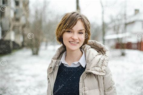 Cute Teen Girl Having Fun On A Walk In City Park On Chilly Winter Day