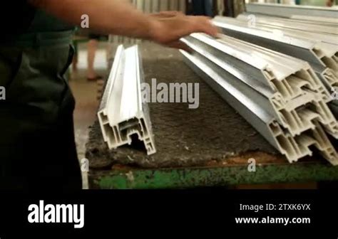 Production Of Pvc Windows Male Worker Punctures The Details Of A Pvc