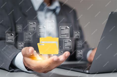 Premium Photo Businessman Using Laptop With Database On Computer To
