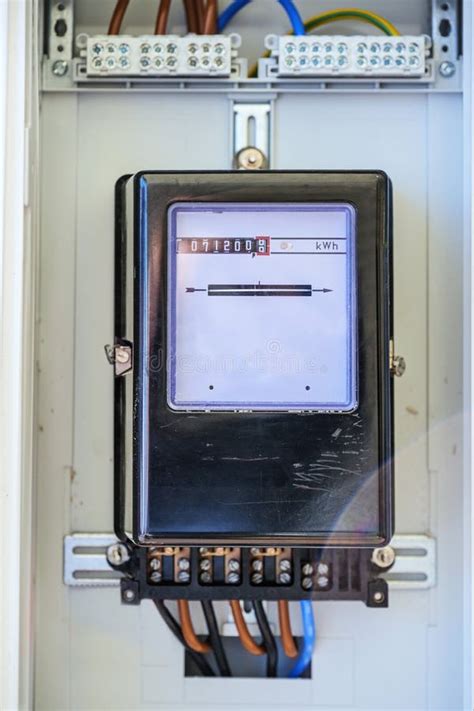 Analog Electricity Meter Box Behind Glass Measures The Consumption Of
