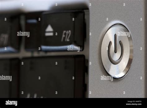 Power Switch On A Modern Sleek Laptop Computer Stock Photo Alamy