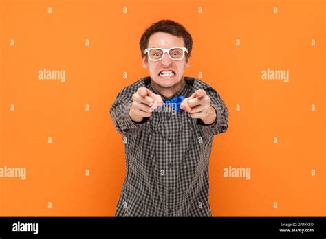Portrait Of Angry Aggressive Carazy Man Nerd Pointing At You Looking