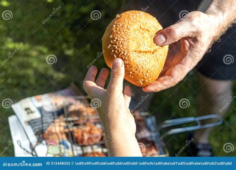 Father Gives His Son Bread Sesame Bun Close Up Of Hands Quotes From
