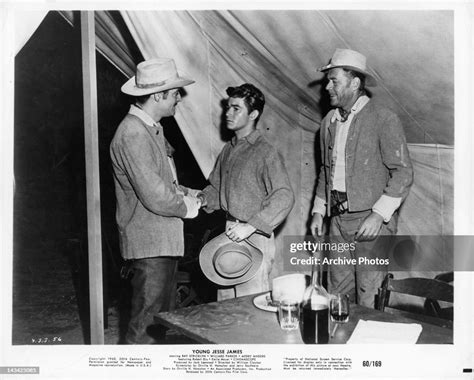 Man Shakes Hand Of Ray Stricklyn With A Smiling Willard Parker Behind