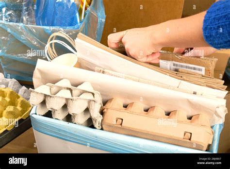 Woman Sorting Waste Close Up Stock Photo Alamy