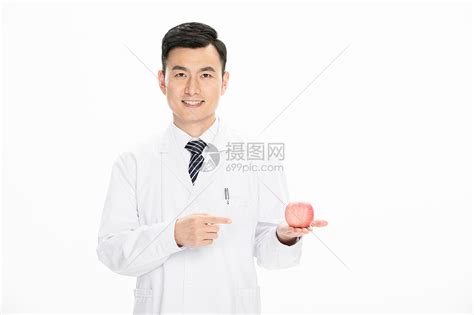 男医生拿苹果高清图片下载 正版图片501367471 摄图网
