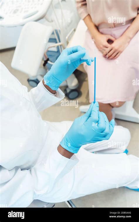 Close Up Of Woman Having Test For Sexually Transmitted Disease With