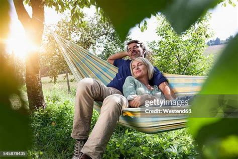 Mature Couple In Hammock Photos And Premium High Res Pictures Getty