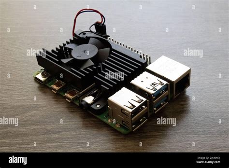 Raspberry Pi Microcomputer Equipped With Large Black Heatsink For
