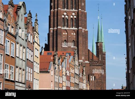 City Of Gdansk In Poland Historical Tenement Houses Apartment Buildings With Gables Against