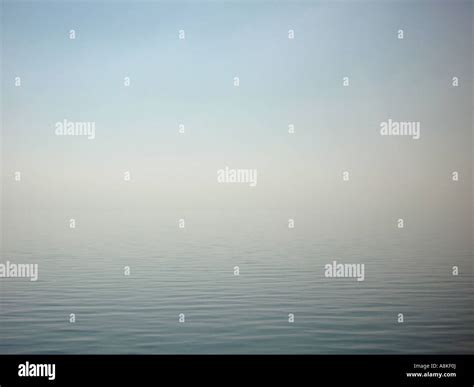 Abstract Photo Of Sky And Sea With Fog Obscuring The Horizion In A