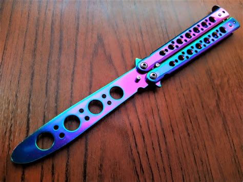 Нож бабочка учебный цветной градиент тренировочный детский заклепки не вылетают фото