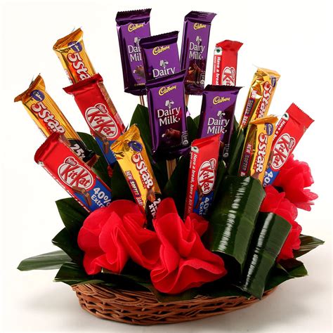 Assorted Chocolates Basket Arrangement Al Warda Gallery Express Delivery In 60 Mins