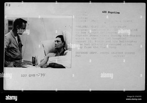 Army Staff Sergeant Lawrence H Allen Is Visited By Marine Helicopter