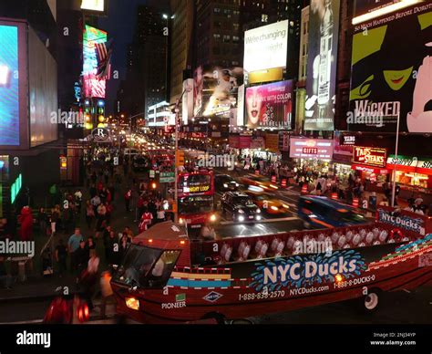 A Night View On Times Square With All The Neon Lights And Big Led