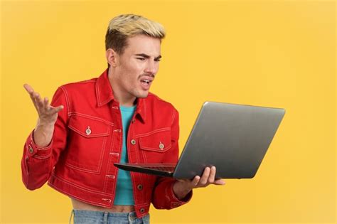 Premium Photo Gay Man Gesturing While Having A Problem With A Laptop