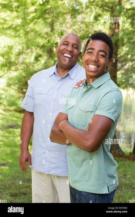 Father And Teenage Son Talking