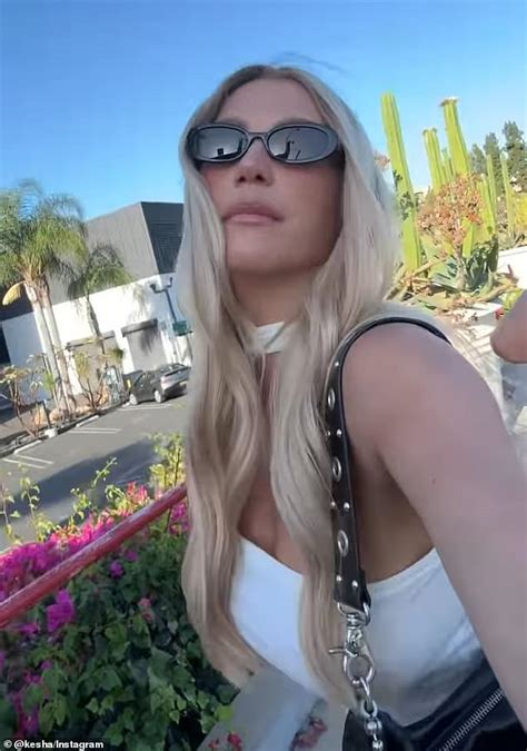 Kesha Flashes Her Butt In Micro Shorts While Carrying A Bag That