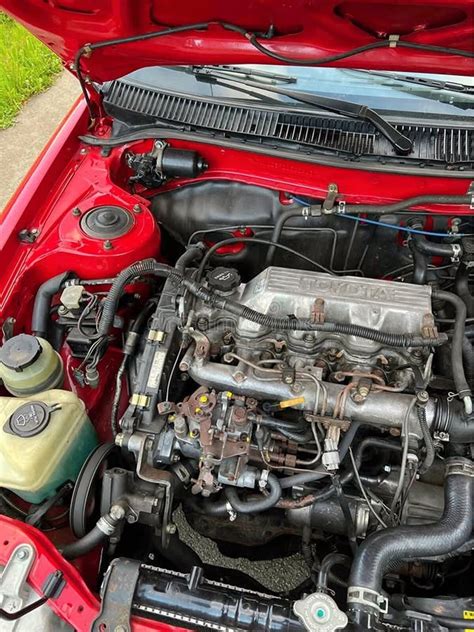 Toyota Engine Showing All Its Components Under The Hood Editorial Photo