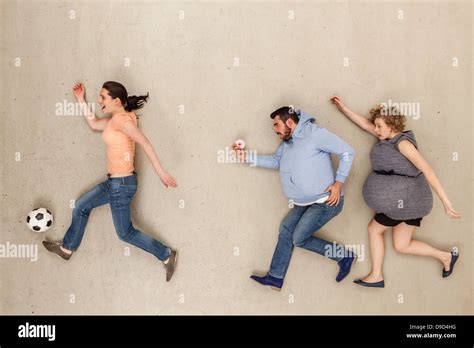 Women And Man Running Against Beige Background Stock Photo Alamy